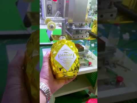 How to stamp on Gold-plated glass wine bottle with pad printer and hot stamping machine