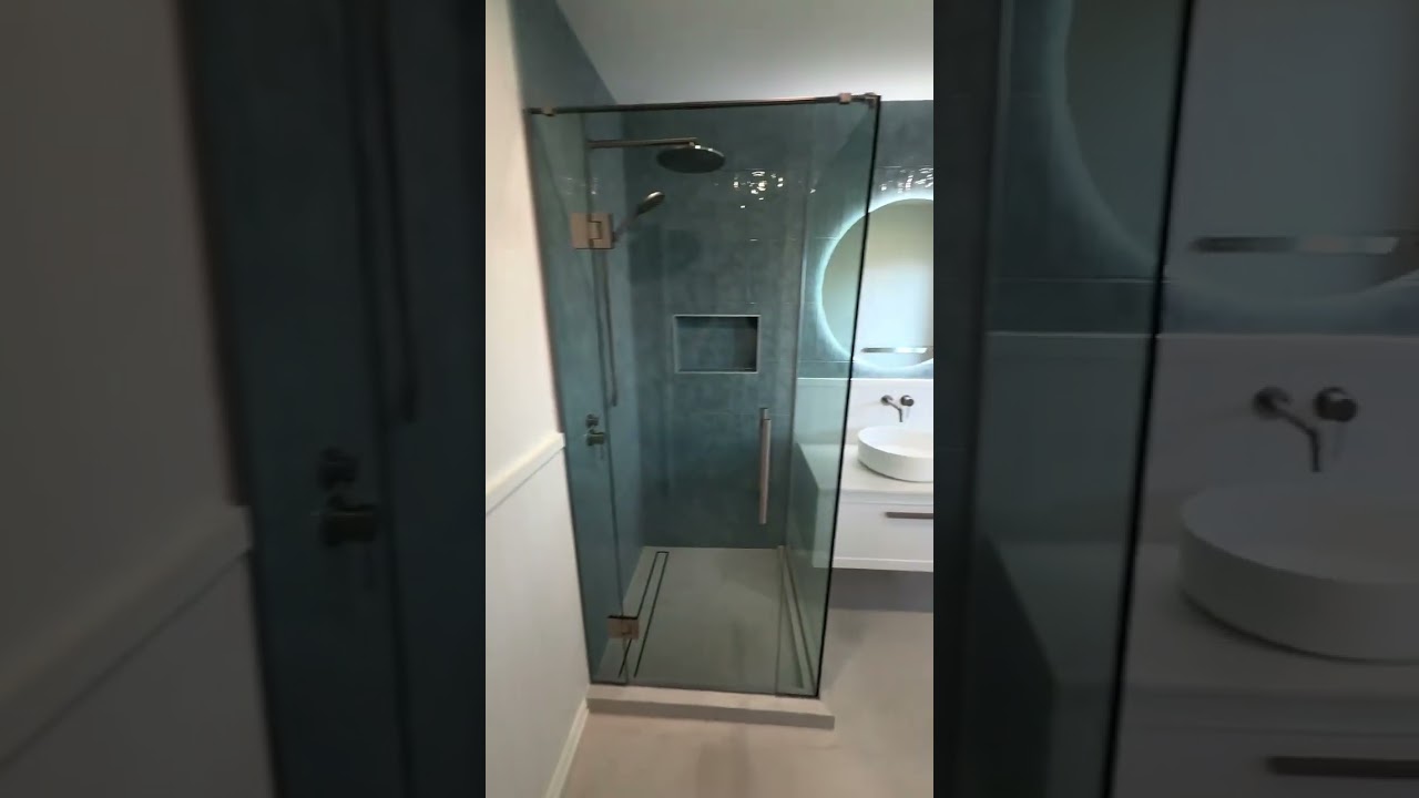 Bathroom upgrade features a stunning teal blue tile