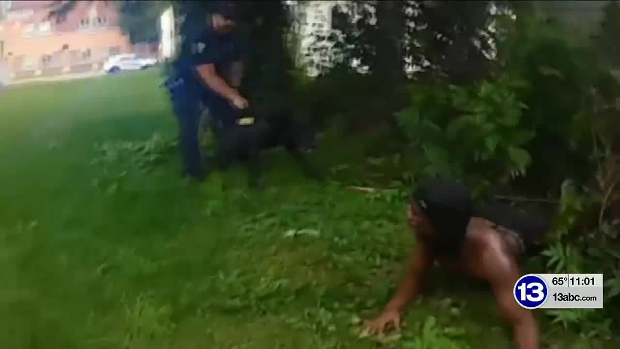 Police release body cam and 911 call following arrest of man with gun outside Woodward High Schoo...