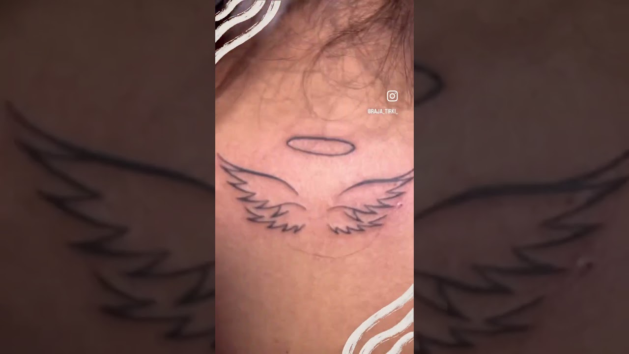 Small wings tattoo