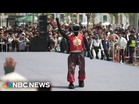 Humanoid robots run a Chinese half-marathon alongside human competitors