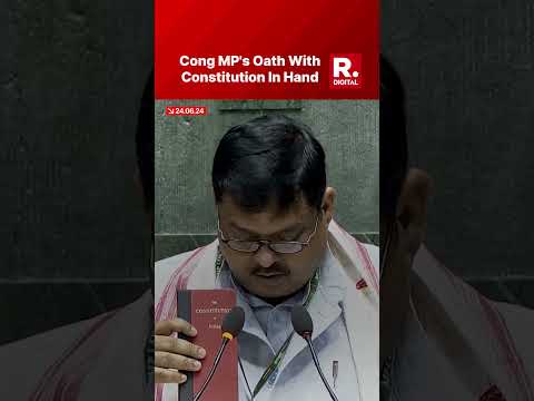Rakibul Hussain Takes Oath As Member of Parliament With Copy Of Constitution In Hand