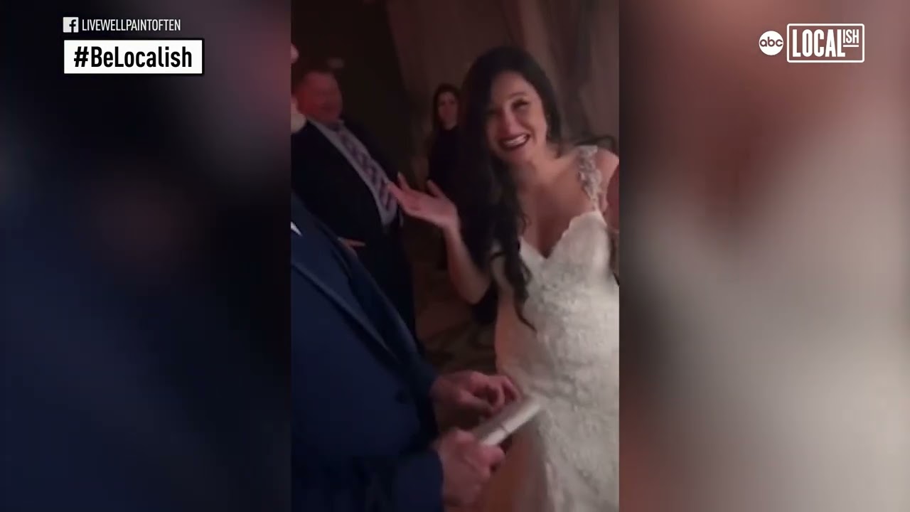 Talk about a work of art, see how one Long Island artist paints couples' live at their weddings