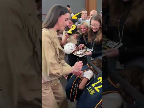 Caitlin ducked under the rope of the red carpet to sign autographs