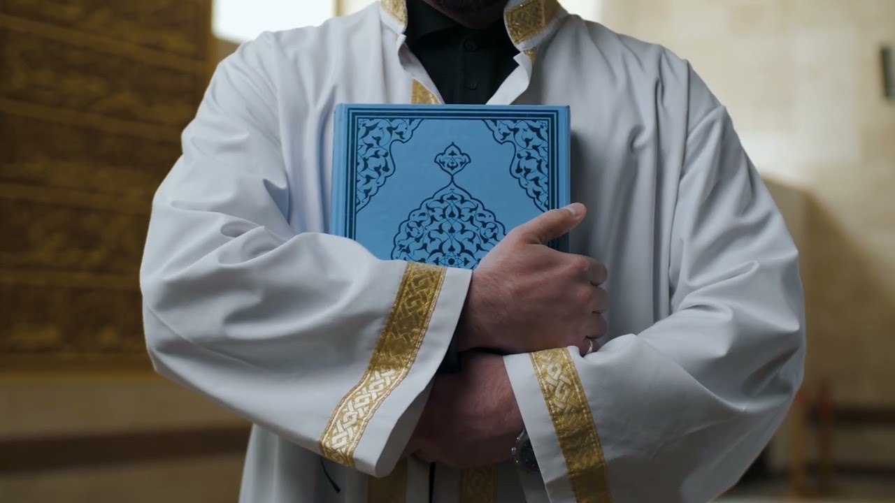 A Muslim Man Hugging A Quran Inside a Mosque | 4K Free Stock Video | Royalty Free Stock Video