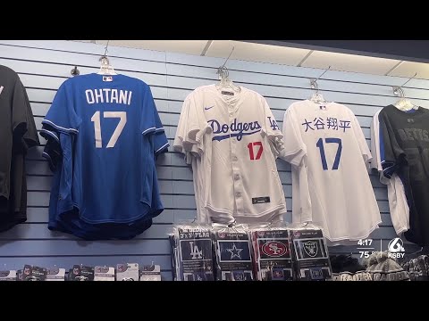 Baseball fans hit local sports merchandise shops to gear up for World Series