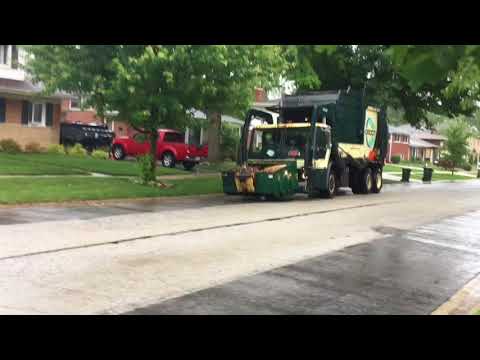 The Groot Man Picking Up Yard Waste