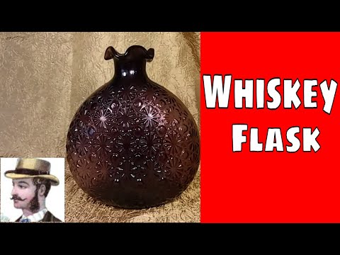 History and Value of Vintage Glass Whiskey Flask