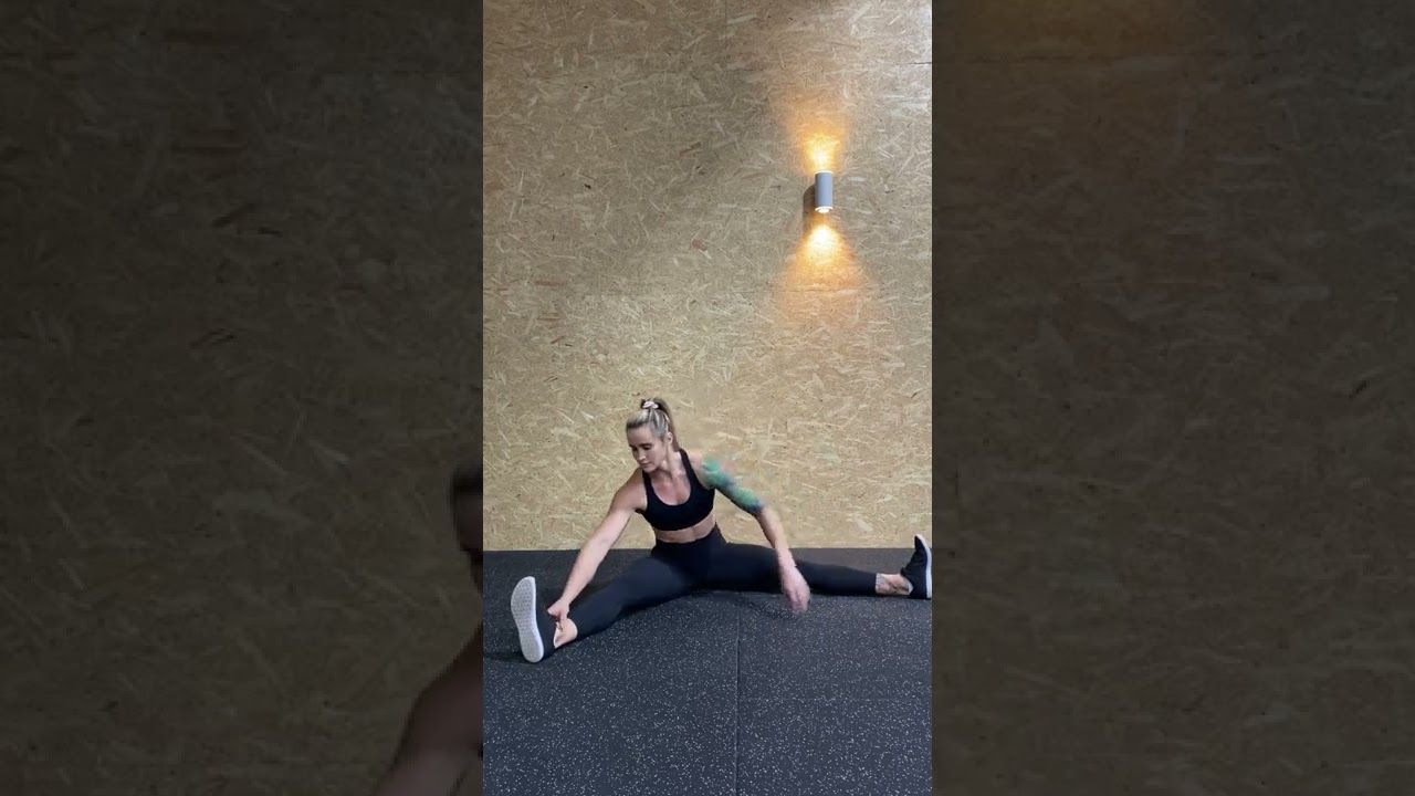 Seated Straddle Stretch (reach right and left)