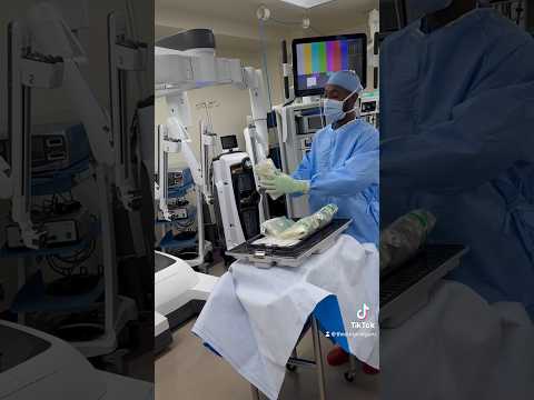 Draping a Divinci XI arm for robotic surgery 🤖😷