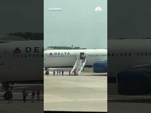 Passengers evacuated from burning Delta plane at airport in Orlando