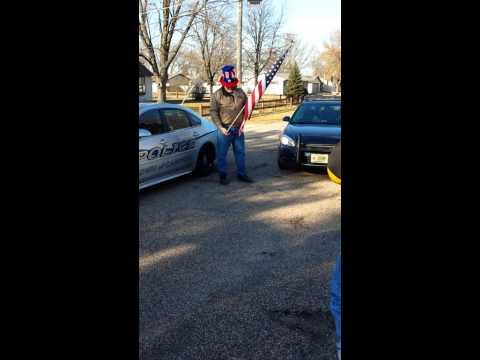 Uncle Sam waiting for his citation for displaying American Flag 12/07/2013