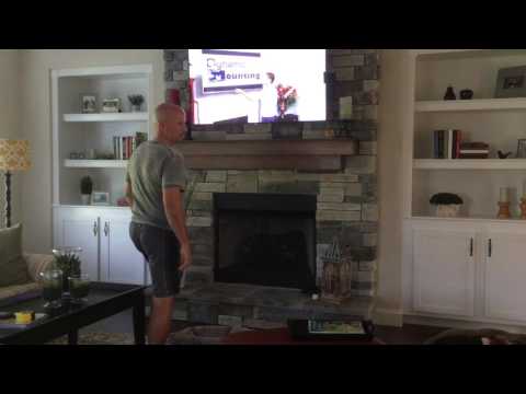 Over the fireplace TV mount from Dynamic Mounting