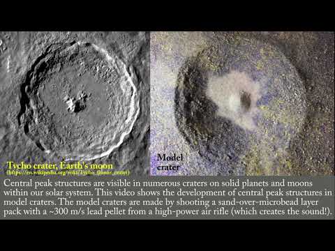 Central peak formation in model impact craters
