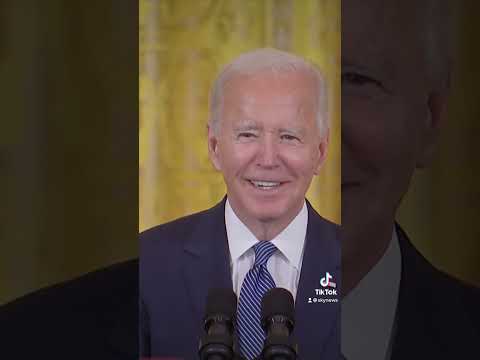 US President Joe Biden reacts to Rishi Sunak's win