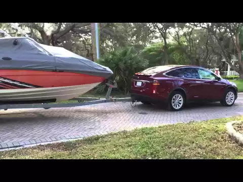Watching a Tesla Model X Towing a Boat Is Oddly Satisfying - autoevolution